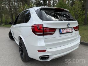 White BMW X5 2014 in Riga, with an engine capacity of 3.00 L and mileage of 203 thousand km for 21500 €, photo 7 on AUTOMOTO.COM.LV