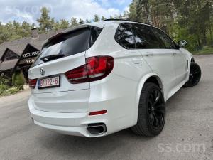 White BMW X5 2014 in Riga, with an engine capacity of 3.00 L and mileage of 203 thousand km for 21500 €, photo 8 on AUTOMOTO.COM.LV