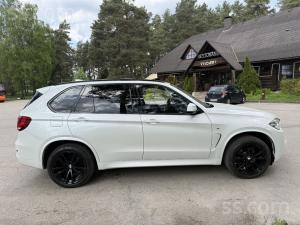 White BMW X5 2014 in Riga, with an engine capacity of 3.00 L and mileage of 203 thousand km for 21500 €, photo 11 on AUTOMOTO.COM.LV