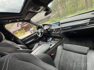 White BMW X5 2014 in Riga, with an engine capacity of 3.00 L and mileage of 203 thousand km for 21500 €, photo 26 on AUTOMOTO.COM.LV