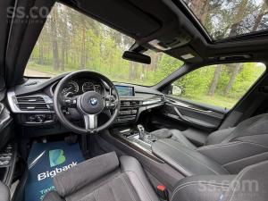 White BMW X5 2014 in Riga, with an engine capacity of 3.00 L and mileage of 203 thousand km for 21500 €, photo 28 on AUTOMOTO.COM.LV