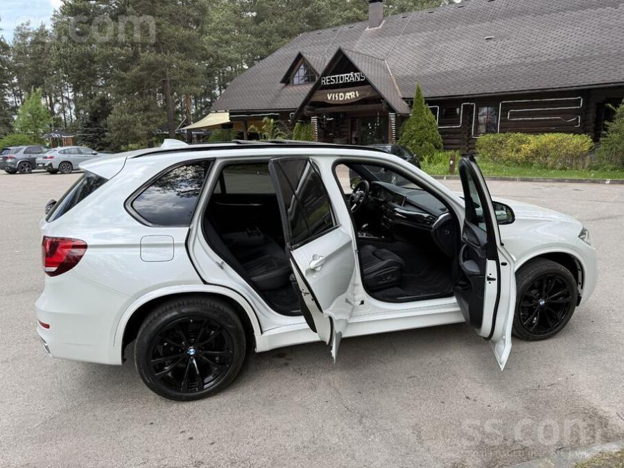White BMW X5 2014 in Riga, with an engine capacity of 3.00 L and mileage of 203 thousand km for 21500 €, photo 32 on AUTOMOTO.COM.LV