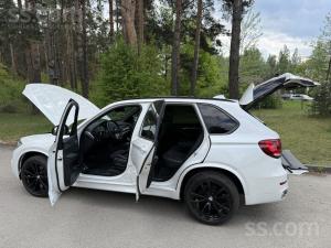 White BMW X5 2014 in Riga, with an engine capacity of 3.00 L and mileage of 203 thousand km for 21500 €, photo 33 on AUTOMOTO.COM.LV