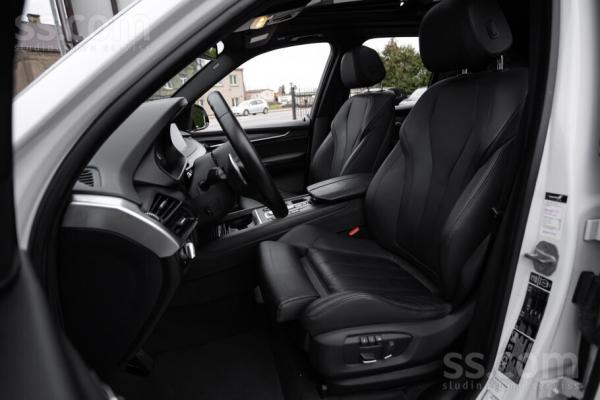 White BMW X5 2014 in Jelgava, with an engine capacity of 3.00 L and mileage of 215 thousand km for 22900 €, photo 9 on AUTOMOTO.COM.LV