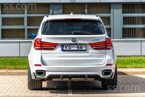 White BMW X5 2014 in Riga, with an engine capacity of 3.00 L and mileage of 255 thousand km for 20500 €, photo 8 on AUTOMOTO.COM.LV
