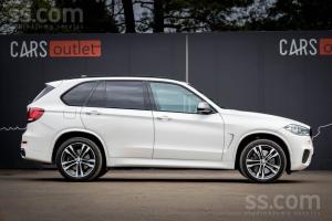 White BMW X5 2014 in Riga, with an engine capacity of 3.00 L and mileage of 301 thousand km for 19990 €, photo 5 on AUTOMOTO.COM.LV