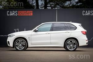 White BMW X5 2014 in Riga, with an engine capacity of 3.00 L and mileage of 301 thousand km for 19990 €, photo 6 on AUTOMOTO.COM.LV