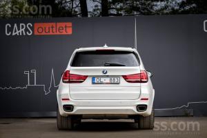 White BMW X5 2014 in Riga, with an engine capacity of 3.00 L and mileage of 301 thousand km for 19990 €, photo 9 on AUTOMOTO.COM.LV