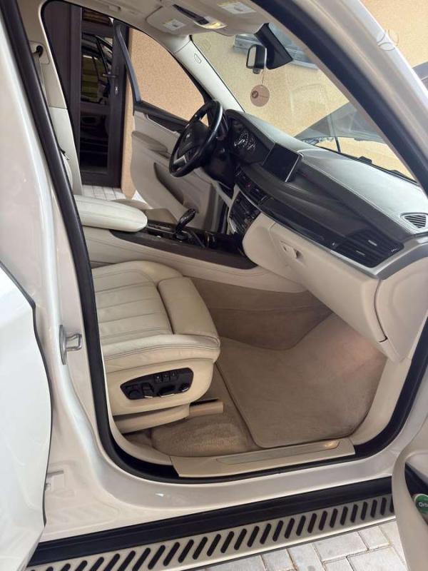 White BMW X5 2014 in Marijampole, with an engine capacity of 4.40 L and mileage of 255 thousand km for 12999 €, photo 10 on AUTOMOTO.COM.LV