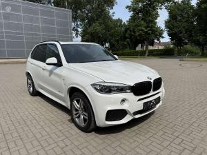 White BMW X5 2014 in Marijampole, with an engine capacity of 2.99 L and mileage of 186 thousand km for 19800 €, photo 5 on AUTOMOTO.COM.LV