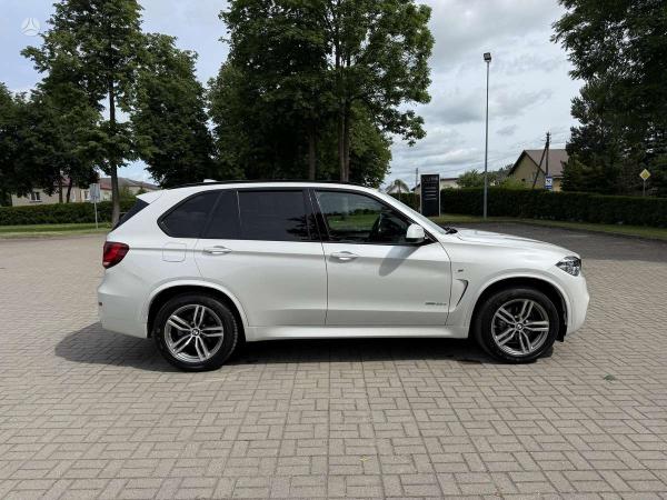 White BMW X5 2014 in Marijampole, with an engine capacity of 2.99 L and mileage of 186 thousand km for 19800 €, photo 5 on AUTOMOTO.COM.LV