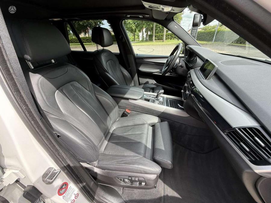 White BMW X5 2014 in Marijampole, with an engine capacity of 2.99 L and mileage of 186 thousand km for 19800 €, photo 23 on AUTOMOTO.COM.LV