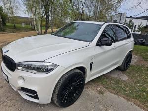 White BMW X5 2014 in Kaunas, with an engine capacity of 3.00 L and mileage of 221 thousand km for 19900 €, photo 4 on AUTOMOTO.COM.LV