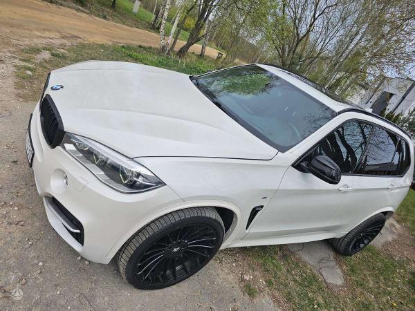 White BMW X5 2014 in Kaunas, with an engine capacity of 3.00 L and mileage of 221 thousand km for 19900 €, photo 4 on AUTOMOTO.COM.LV