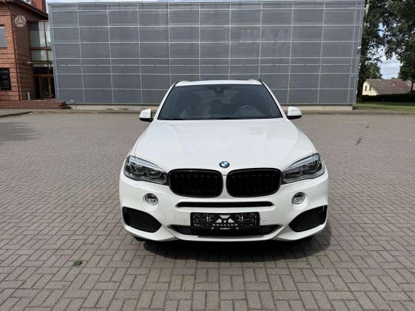 White BMW X5 2014 in Marijampole, with an engine capacity of 2.99 L and mileage of 186 thousand km for 19900 €, photo 4 on AUTOMOTO.COM.LV