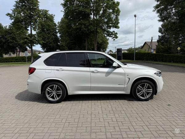 White BMW X5 2014 in Marijampole, with an engine capacity of 2.99 L and mileage of 186 thousand km for 19900 €, photo 8 on AUTOMOTO.COM.LV