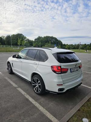 White BMW X5 2014 in Vilnius, with an engine capacity of 3.00 L and mileage of 237 thousand km for 20900 €, photo 5 on AUTOMOTO.COM.LV