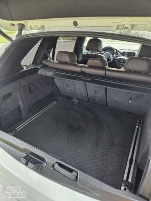 White BMW X5 2014 in Vilnius, with an engine capacity of 3.00 L and mileage of 237 thousand km for 20900 €, photo 16 on AUTOMOTO.COM.LV