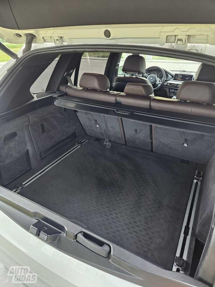 White BMW X5 2014 in Vilnius, with an engine capacity of 3.00 L and mileage of 237 thousand km for 20900 €, photo 16 on AUTOMOTO.COM.LV