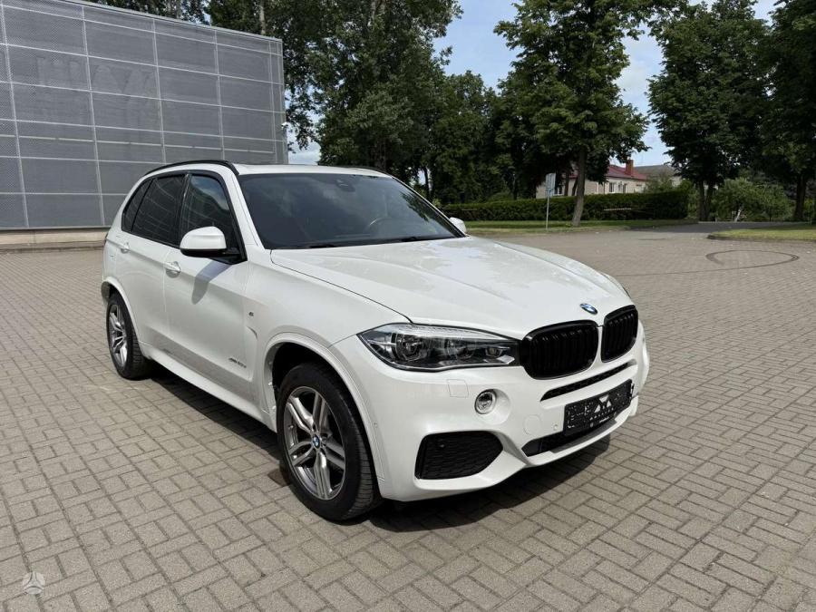 White BMW X5 2014 in Marijampole, with an engine capacity of 2.99 L and mileage of 186 thousand km for 19800 €, photo 7 on AUTOMOTO.COM.LV
