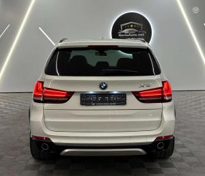 White BMW X5 2014 in Marijampole, with an engine capacity of 3.00 L and mileage of 204 thousand km for 17999 €, photo 5 on AUTOMOTO.COM.LV