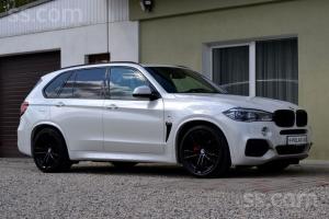 White BMW X5 2014 in Tukums, with an engine capacity of 3.00 L and mileage of 276 thousand km for 20990 €, photo 8 on AUTOMOTO.COM.LV