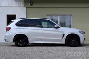 White BMW X5 2014 in Tukums, with an engine capacity of 3.00 L and mileage of 276 thousand km for 20990 €, photo 12 on AUTOMOTO.COM.LV
