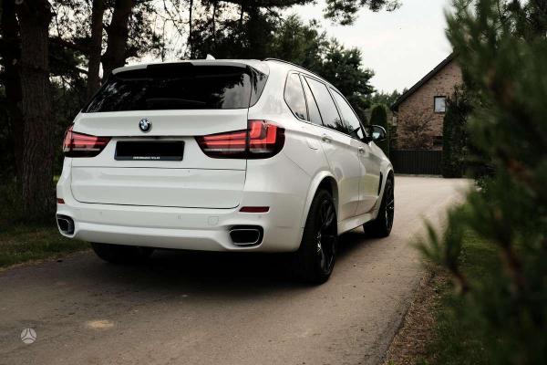 White BMW X5 2014 in Vilnius, with an engine capacity of 2.99 L and mileage of 244 thousand km for 18490 €, photo 6 on AUTOMOTO.COM.LV