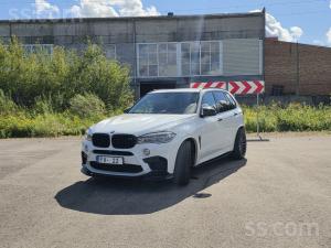 White BMW X5 2014 in Riga, with an engine capacity of 3.00 L and mileage of 251 thousand km for 21999 €, photo 9 on AUTOMOTO.COM.LV