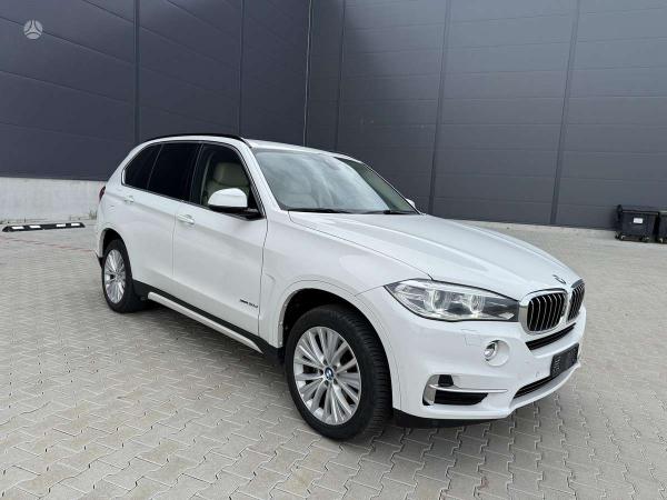 White BMW X5 2014 in Siauliai, with an engine capacity of 2.99 L and mileage of 220 thousand km for 14300 €, photo 4 on AUTOMOTO.COM.LV