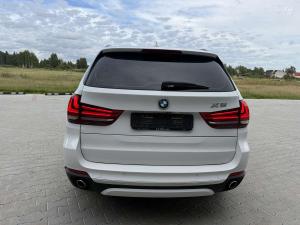 White BMW X5 2014 in Siauliai, with an engine capacity of 2.99 L and mileage of 220 thousand km for 14300 €, photo 8 on AUTOMOTO.COM.LV