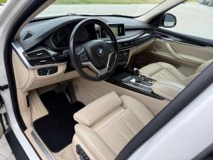 White BMW X5 2014 in Siauliai, with an engine capacity of 2.99 L and mileage of 220 thousand km for 14300 €, photo 14 on AUTOMOTO.COM.LV