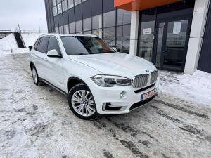 White BMW X5 2015 in Vilnius, with an engine capacity of 2.00 L and mileage of 186 thousand km for 17900 €, photo 6 on AUTOMOTO.COM.LV
