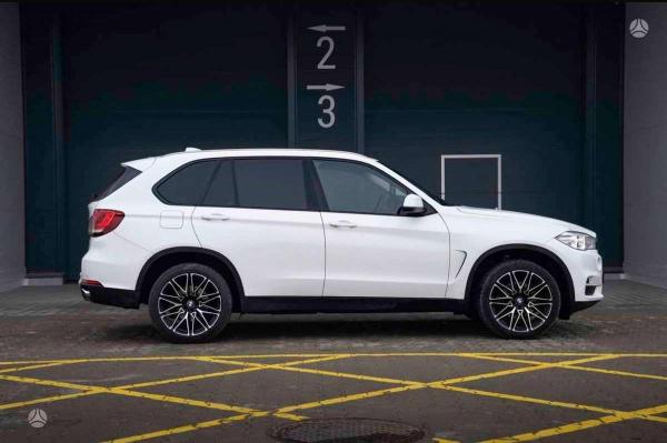 White BMW X5 2015 in Kaunas, with an engine capacity of 2.00 L and mileage of 180 thousand km for 16600 €, photo 6 on AUTOMOTO.COM.LV