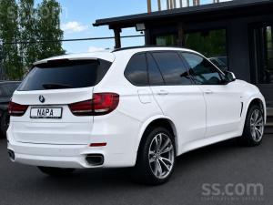 White BMW X5 2015 in Riga, with an engine capacity of 3.00 L and mileage of 238 thousand km for 21900 €, photo 9 on AUTOMOTO.COM.LV