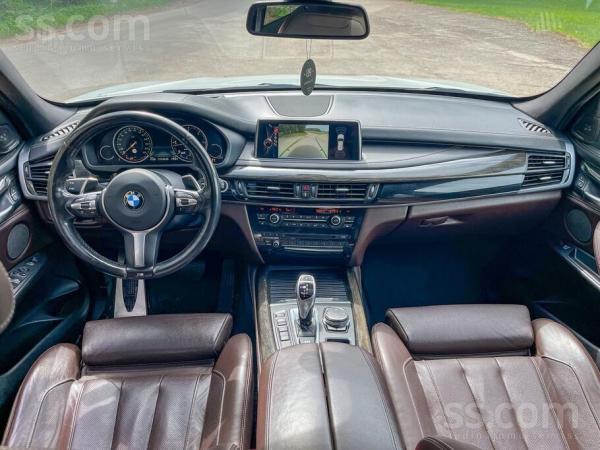 White BMW X5 2015 in Ogre, with an engine capacity of 3.00 L and mileage of 142 thousand km for 24500 €, photo 7 on AUTOMOTO.COM.LV