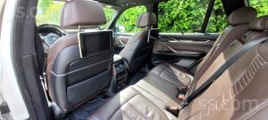 White BMW X5 2015 in Riga, with an engine capacity of 3.00 L and mileage of 184 thousand km for 22300 €, photo 9 on AUTOMOTO.COM.LV