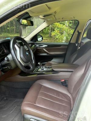 White BMW X5 2015 in Riga, with an engine capacity of 3.00 L and mileage of 226 thousand km for 17500 €, photo 13 on AUTOMOTO.COM.LV