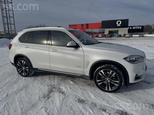 White BMW X5 2015 in Riga, with an engine capacity of 3.00 L and mileage of 200 thousand km for 23550 €, photo 14 on AUTOMOTO.COM.LV