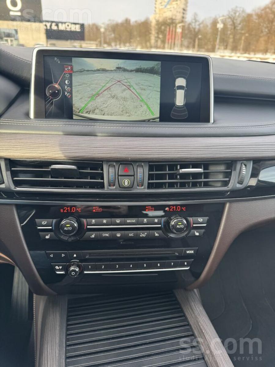 White BMW X5 2015 in Riga, with an engine capacity of 3.00 L and mileage of 200 thousand km for 23550 €, photo 23 on AUTOMOTO.COM.LV