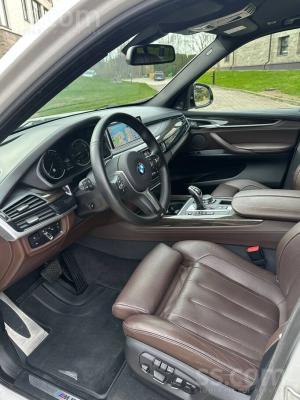 White BMW X5 2015 in Riga, with an engine capacity of 3.00 L and mileage of 142 thousand km for 25500 €, photo 11 on AUTOMOTO.COM.LV