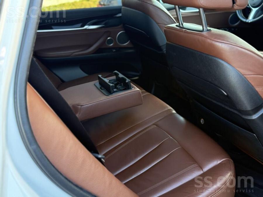 White BMW X5 2015 in Jelgava, with an engine capacity of 3.00 L and mileage of 276 thousand km for 19650 €, photo 21 on AUTOMOTO.COM.LV