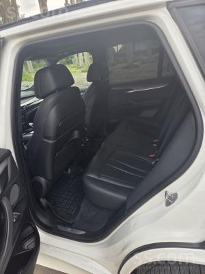 White BMW X5 2015 in Riga, with an engine capacity of 3.00 L and mileage of 230 thousand km for 25500 €, photo 5 on AUTOMOTO.COM.LV