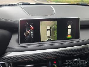 White BMW X5 2015 in Riga, with an engine capacity of 3.00 L and mileage of 64 thousand km for 34000 €, photo 18 on AUTOMOTO.COM.LV