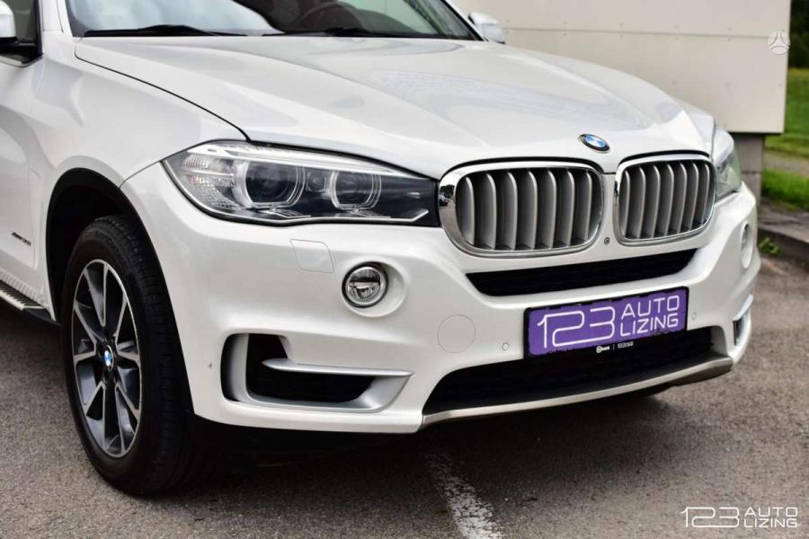 White BMW X5 2015 in Kretinga, with an engine capacity of 4.40 L and mileage of 239 thousand km for 11999 €, photo 7 on AUTOMOTO.COM.LV
