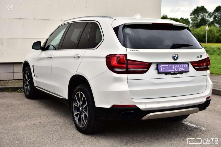 White BMW X5 2015 in Kretinga, with an engine capacity of 4.40 L and mileage of 239 thousand km for 11999 €, photo 8 on AUTOMOTO.COM.LV