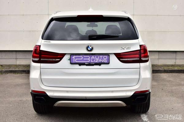 White BMW X5 2015 in Kretinga, with an engine capacity of 4.40 L and mileage of 239 thousand km for 11999 €, photo 8 on AUTOMOTO.COM.LV