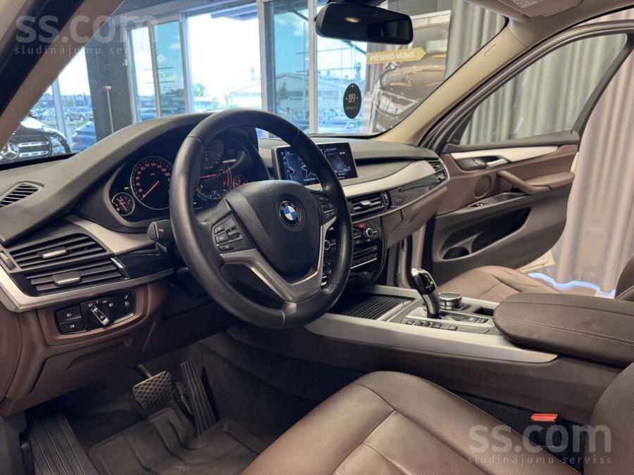 White BMW X5 2016 in Riga, with an engine capacity of 2.00 L and mileage of 182 thousand km for 20599 €, photo 13 on AUTOMOTO.COM.LV