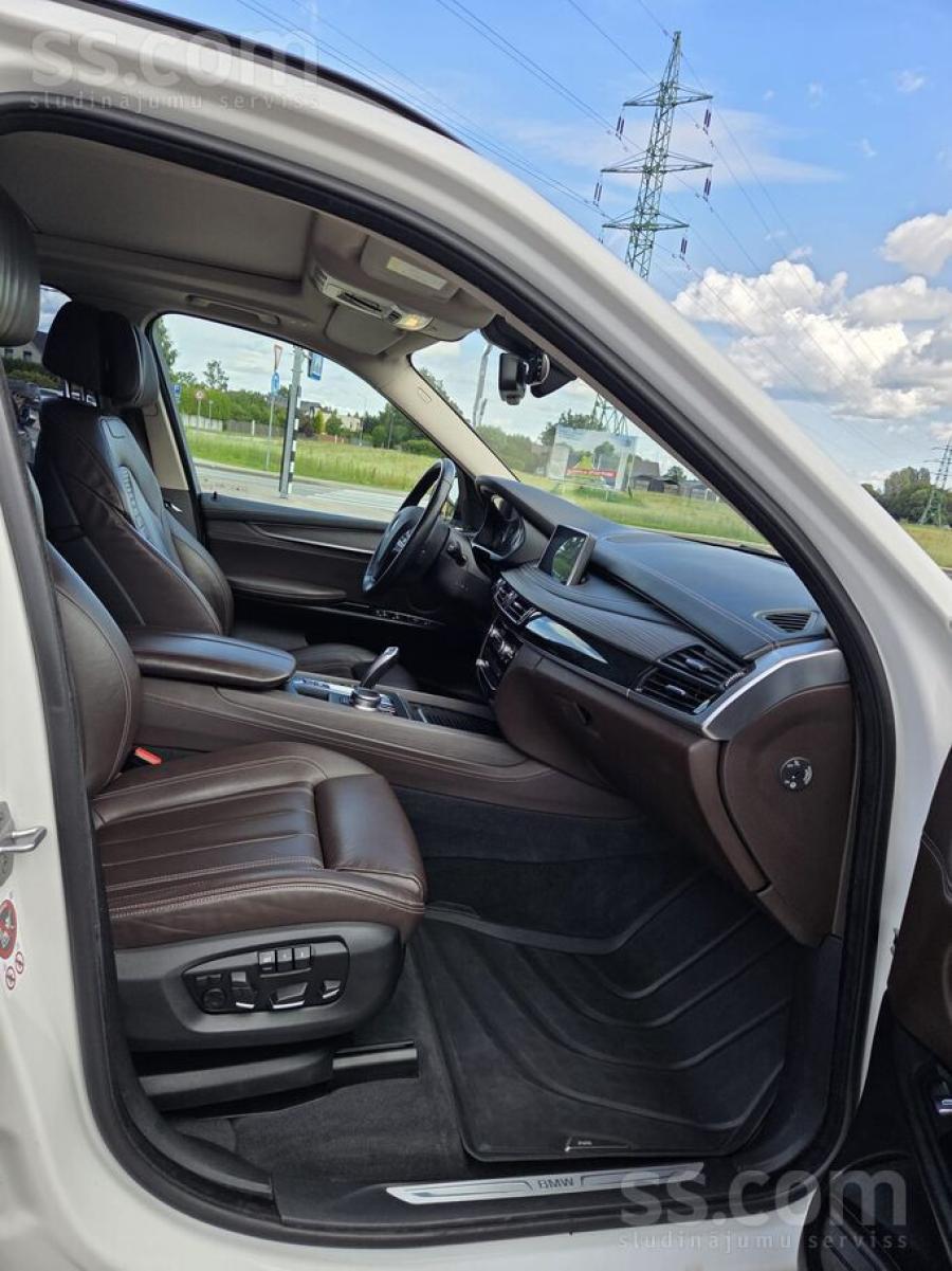 White BMW X5 2016 in Riga, with an engine capacity of 3.00 L and mileage of 148 thousand km for 34200 €, photo 9 on AUTOMOTO.COM.LV