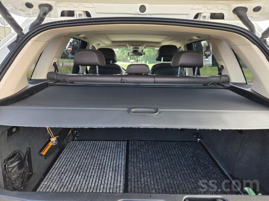 White BMW X5 2016 in Riga, with an engine capacity of 3.00 L and mileage of 148 thousand km for 34200 €, photo 10 on AUTOMOTO.COM.LV
